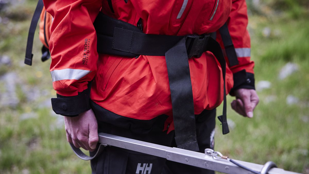 What do mountain rescue team members wear on operations? | Advnture