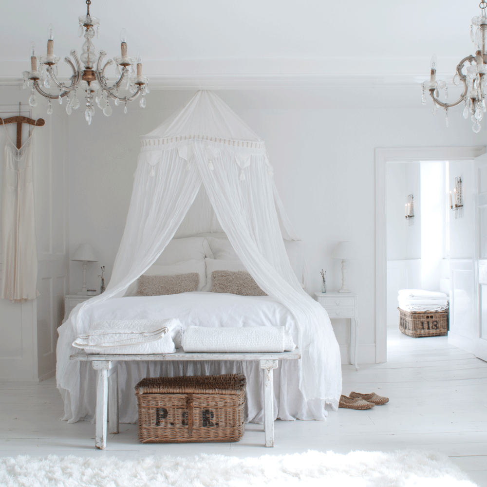A quirky old rectory on numerous levels celebrates an all-white palette ...