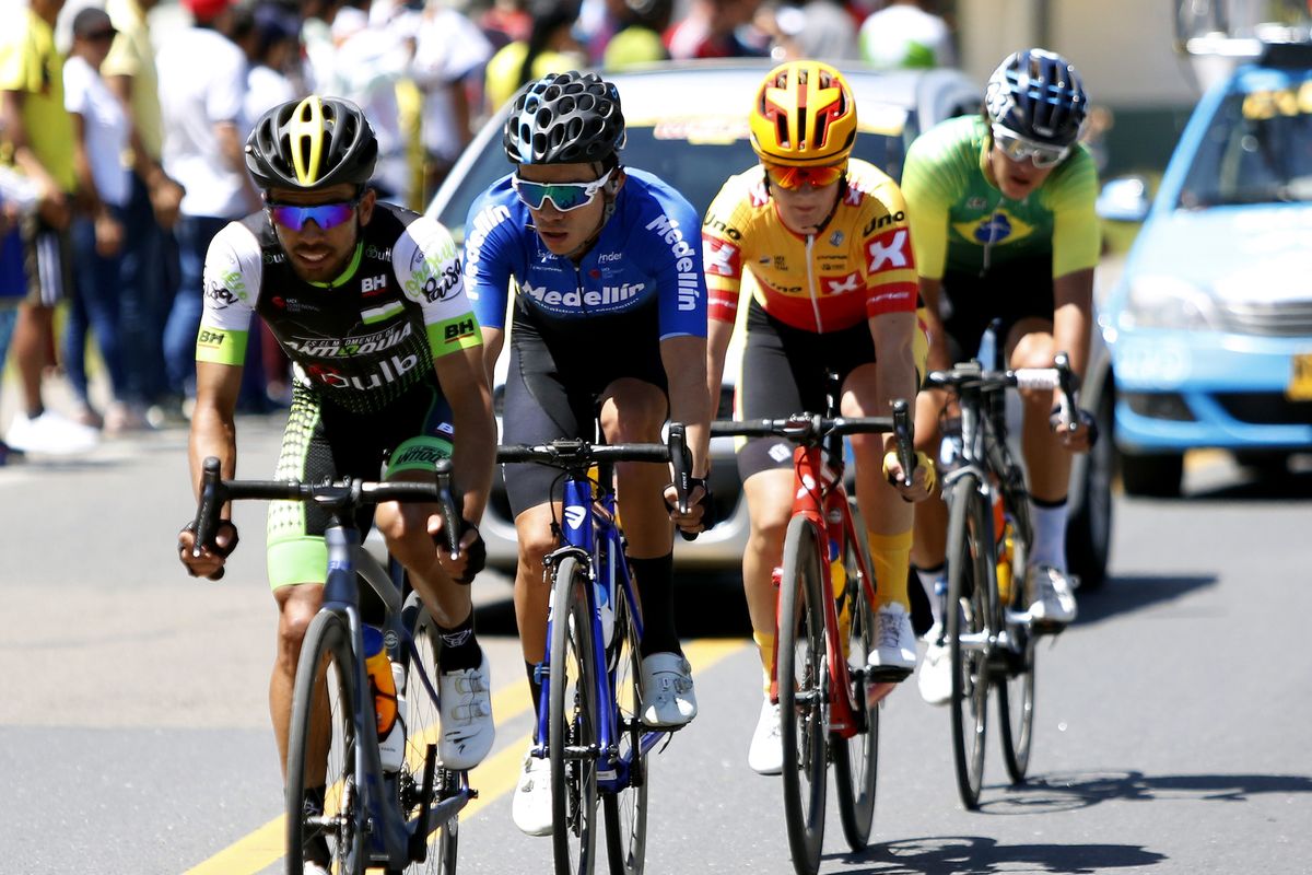 Colombian rider takes victory by crashing across the finish line while ...