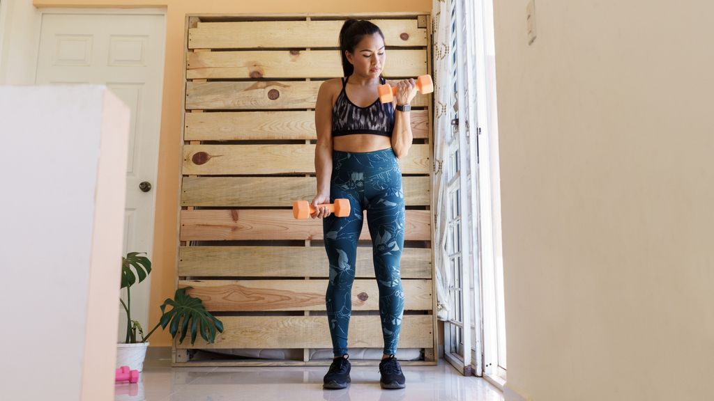 A strength-training specialist says these are the five dumbbell exercises everyone should be ...