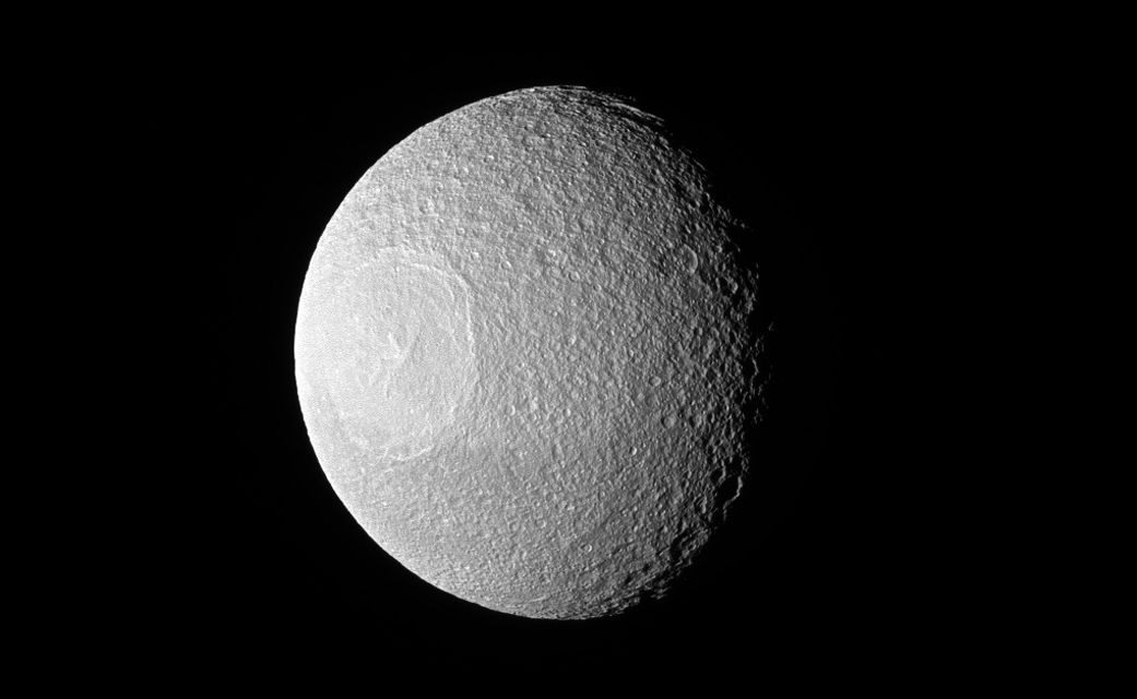 Saturn's Battered Moon Tethys Gets a Closeup from Cassini | Space