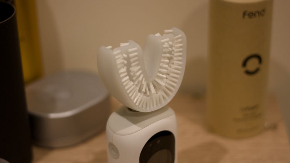 I used this AI-powered full-mouth toothbrush even though my dentist ...