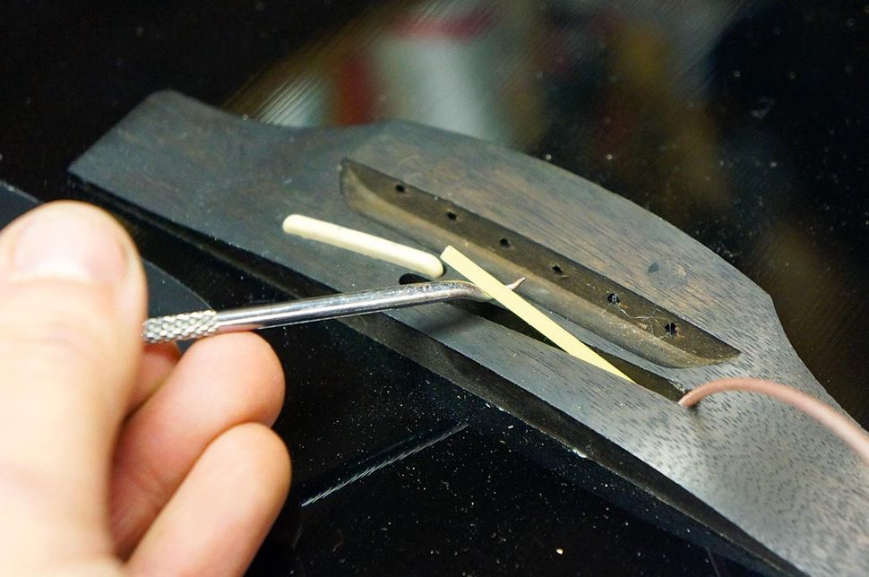 How to lower acoustic guitar strings | Guitar World
