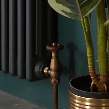 How to flush a radiator to improve your heating | Ideal Home