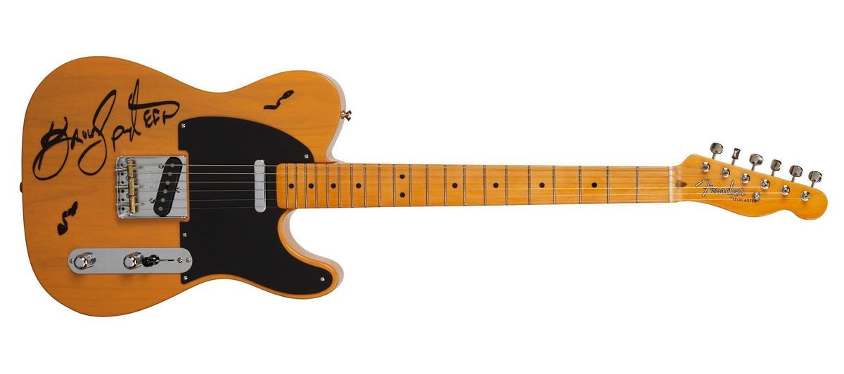 Guitars signed by McCartney, Slash, Springsteen auctioned off for ...