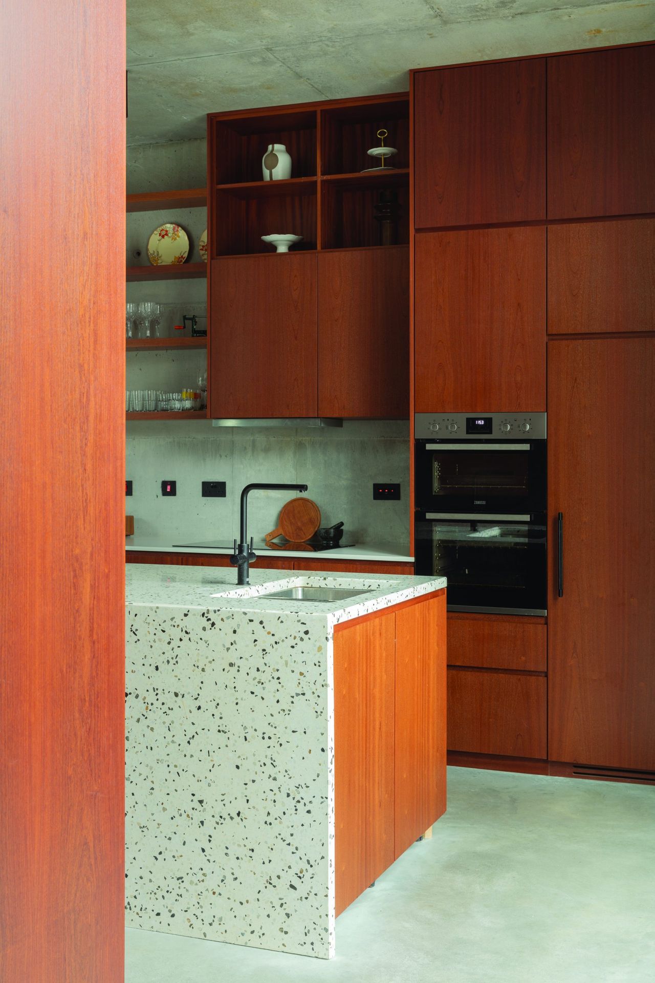 10 waterfall countertop kitchen ideas from top designers | Livingetc