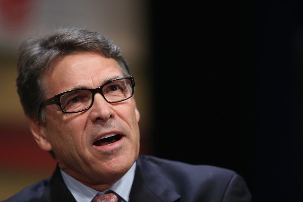 Rick Perry thinks allowing guns in movie theaters would stop shootings ...