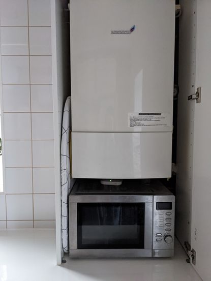 How to box in a boiler using IKEA's SEKTION cabinet frame | Real Homes