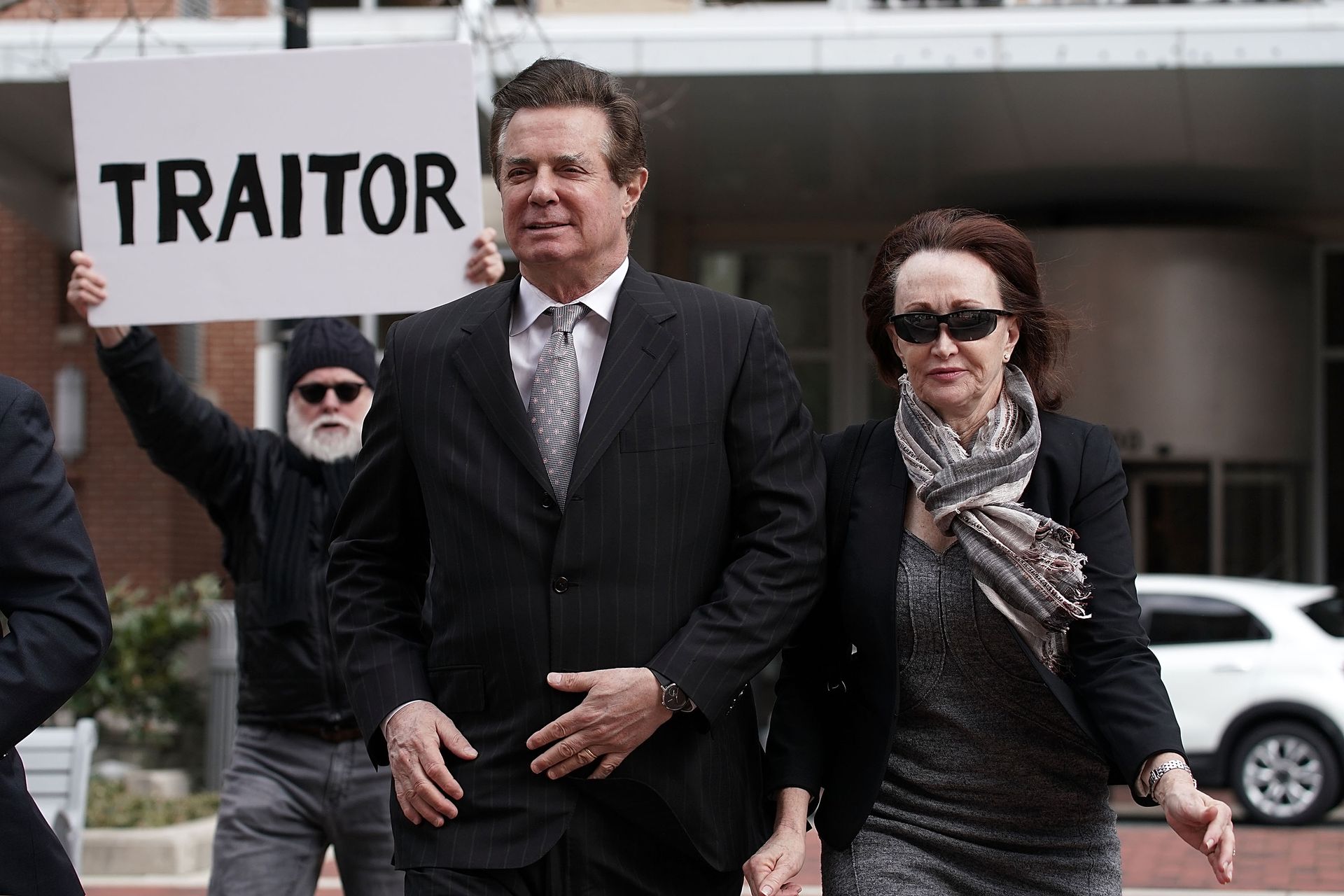 The Manafort sign guy's greatest hits | The Week