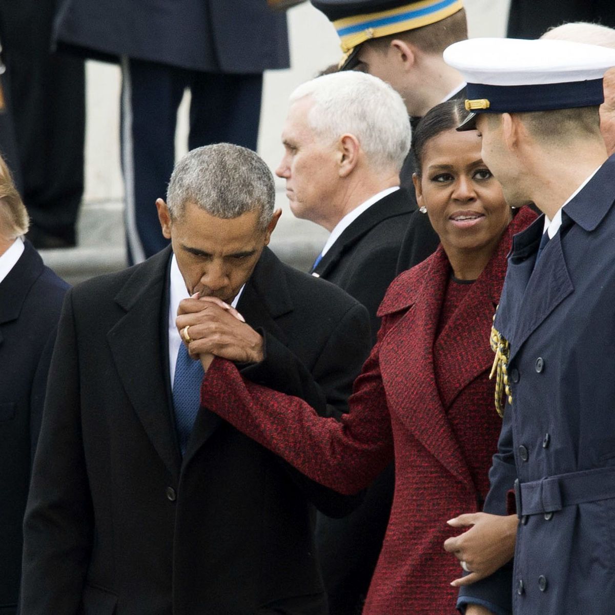 Watch Barack and Michelle Obama's Sweet Hand Kiss at Donald Trump's ...