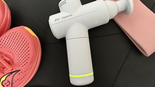 I tried this budget-friendly heated massage gun on my sore muscles – 5 ...