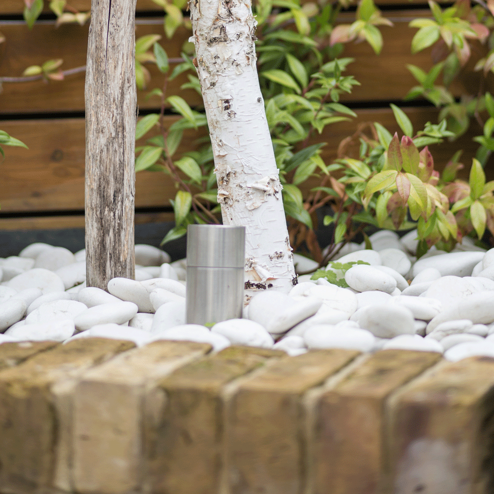 Structural planting, lighting and built-in furniture transform unloved ...