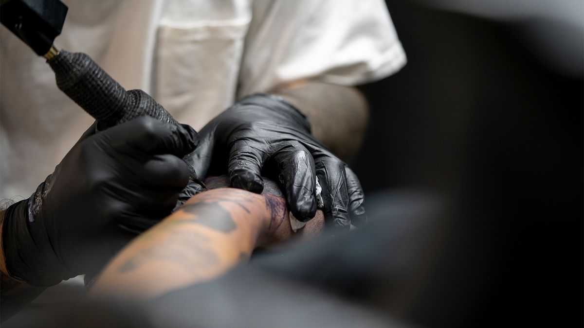 Tinder offers free tattoos to cover up your ex's name | Creative Bloq