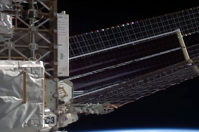 Spacewalking astronauts deploy second new solar array for space station ...