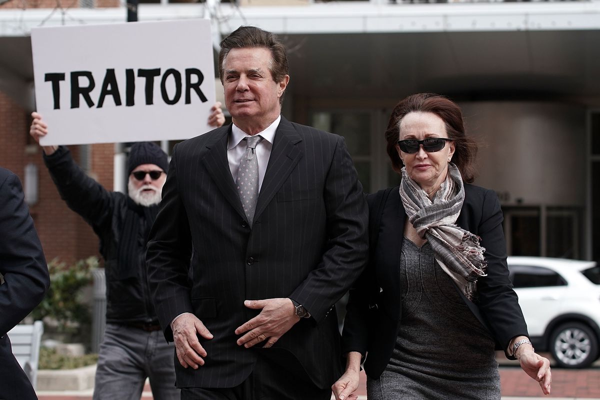 The Manafort sign guy's greatest hits | The Week