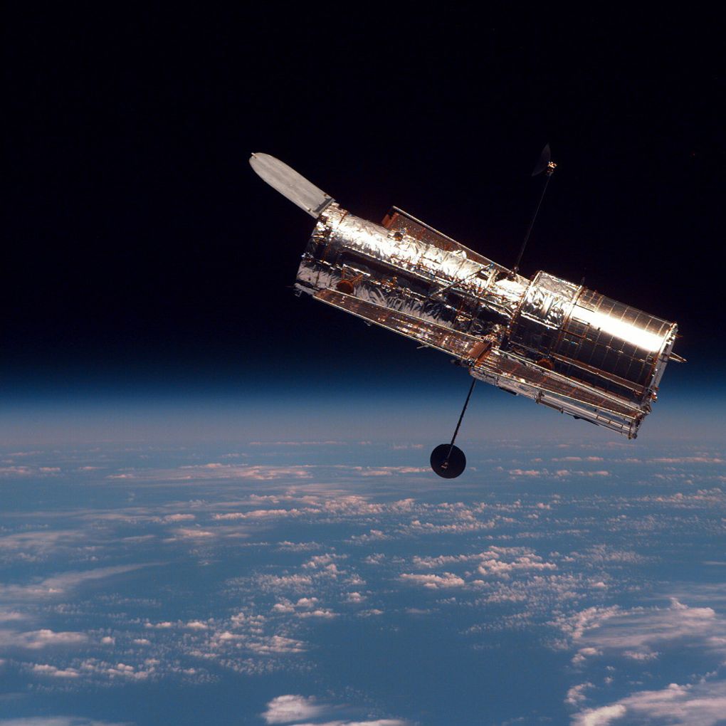 Space Shuttle Deploying Hubble