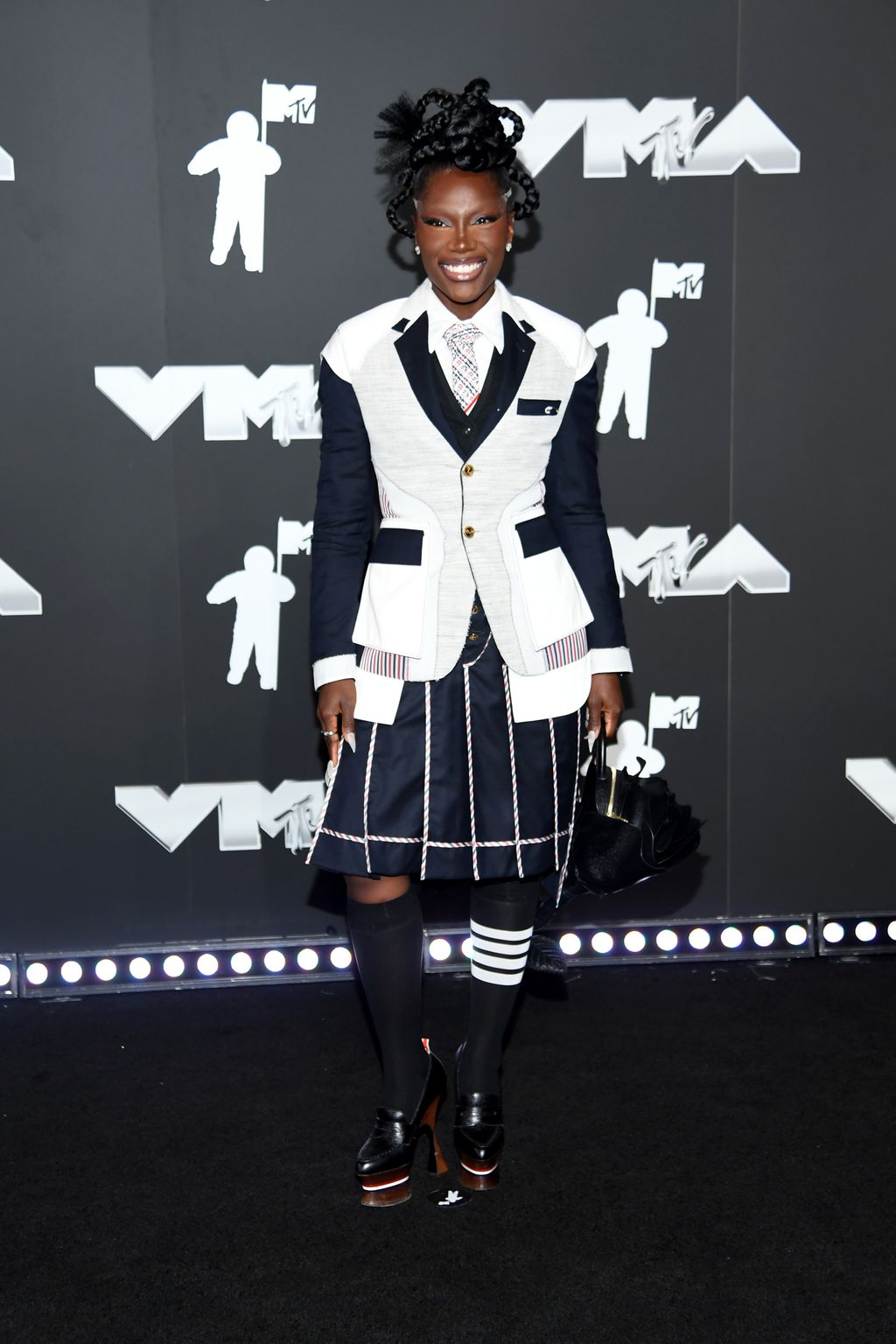 Doechii Is a Preppy "Swamp Princess" in Thom Browne at the 2025 Grammys Red Carpet | Marie Claire