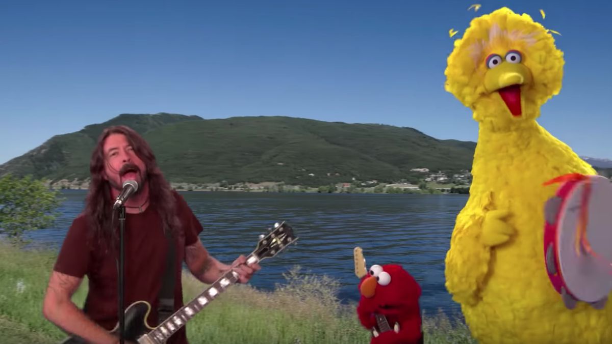 Watch Dave Grohl rock a taped-up Gibson with Elmo and Big Bird on ...