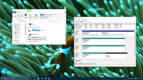 How to combine multiple hard drives into one volume on Windows 10 ...
