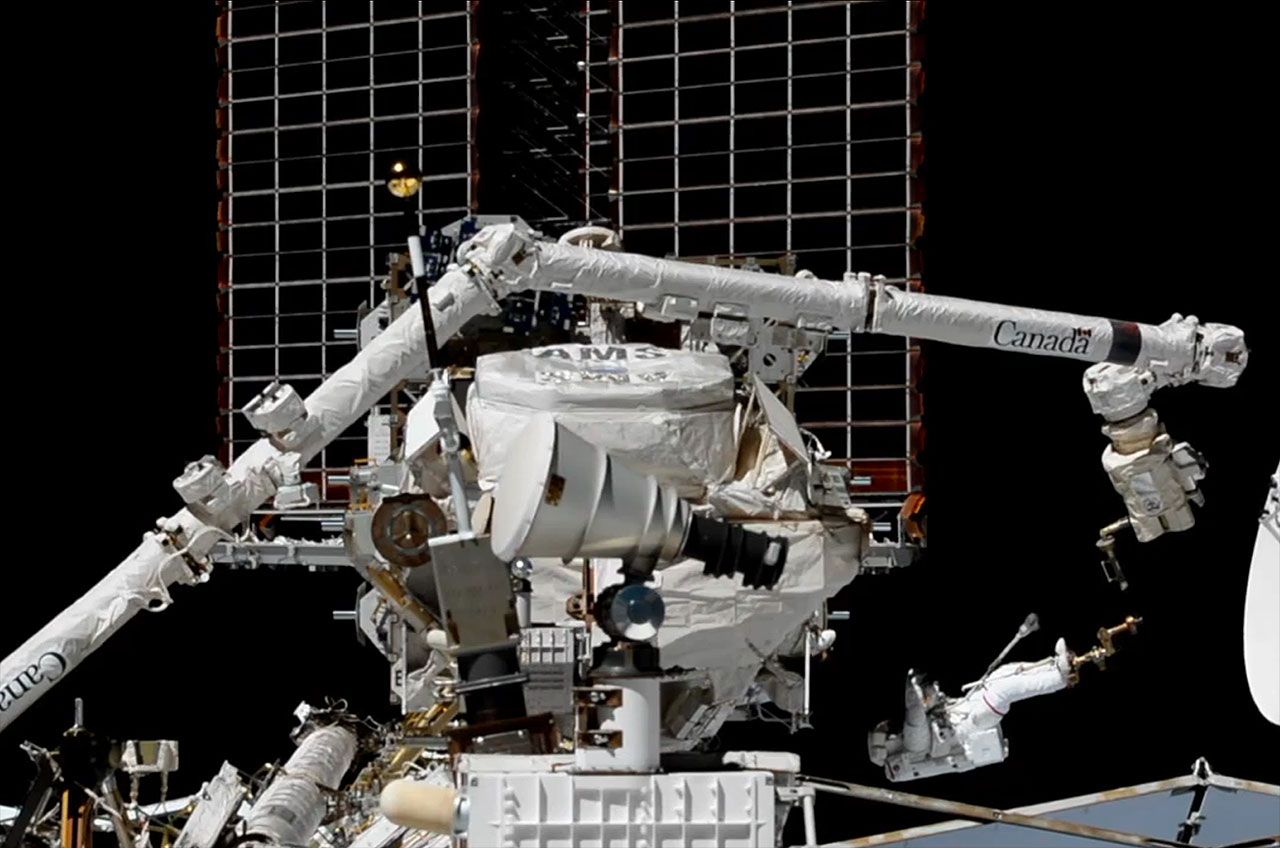 Astronauts Perform Spacewalk Surgery to Repair Cosmic Ray Detector | Space