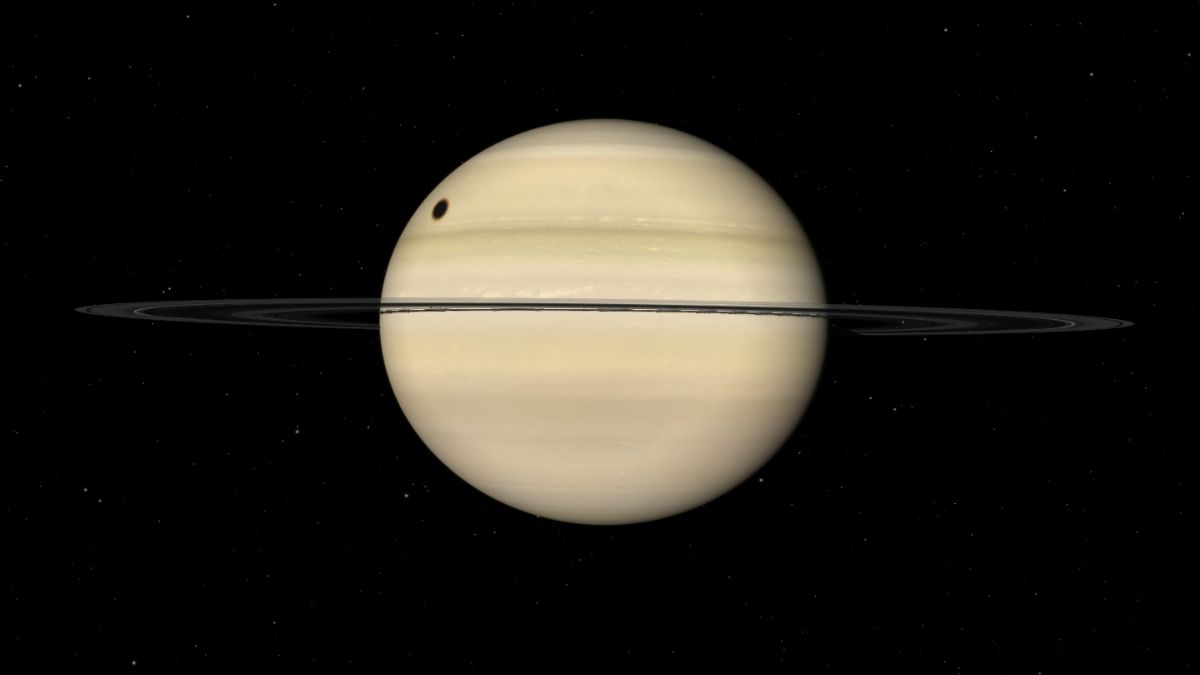 A vast shadow will sweep over Saturn's cloud tops early on July 18 ...