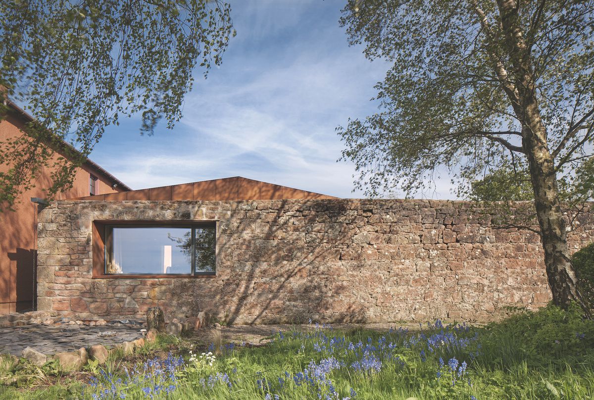 Discover how this striking steel-clad extension has transformed a ...