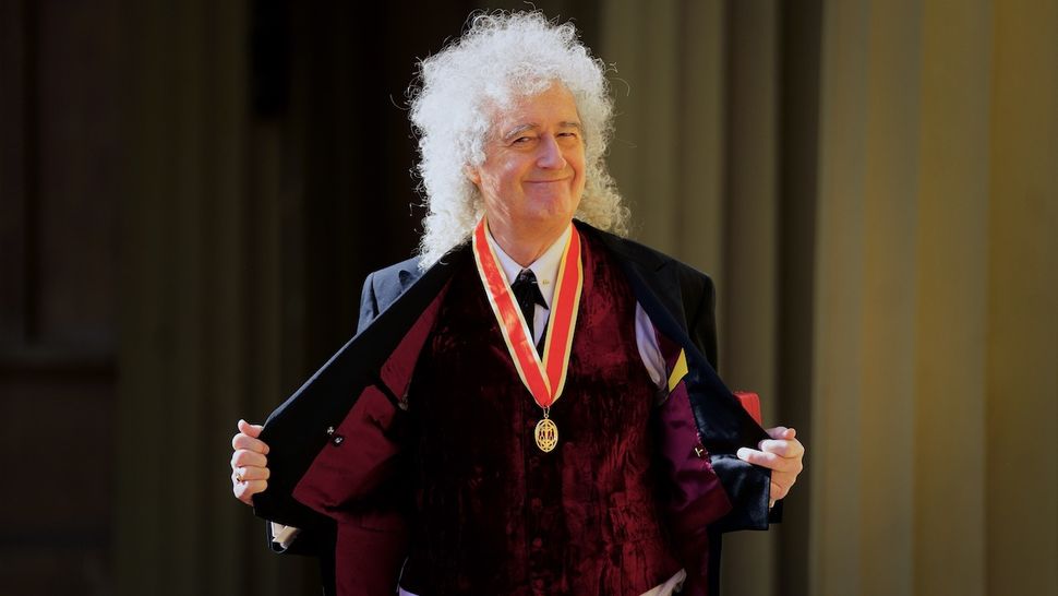 Queen’s Brian May knighted by King Charles at Buckingham Palace | Louder