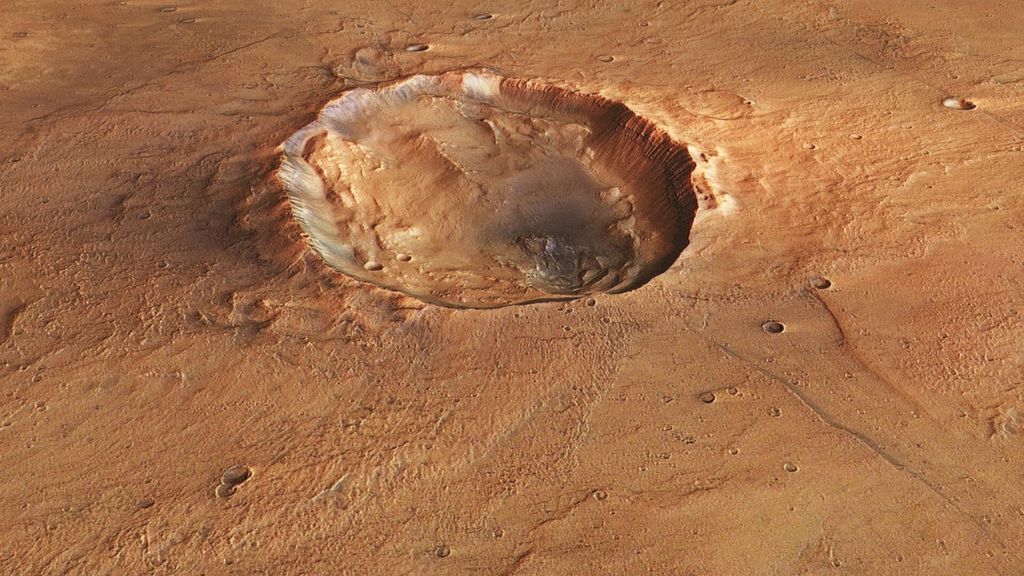 Mars orbiter sees 'butterfly' crater spread its wings on the Red Planet ...