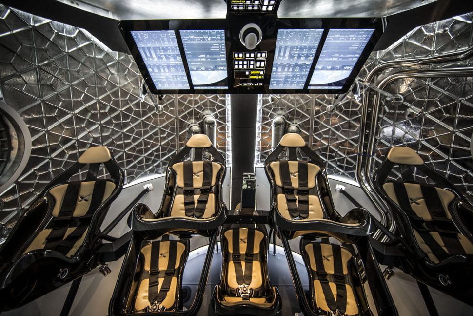 How many astronauts can fly on a SpaceX Crew Dragon capsule? | Space