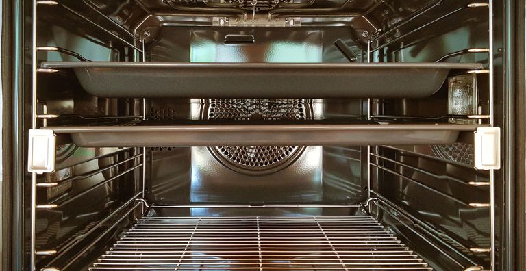 How to clean oven trays to remove burnt-on food – 6 ways | Woman & Home