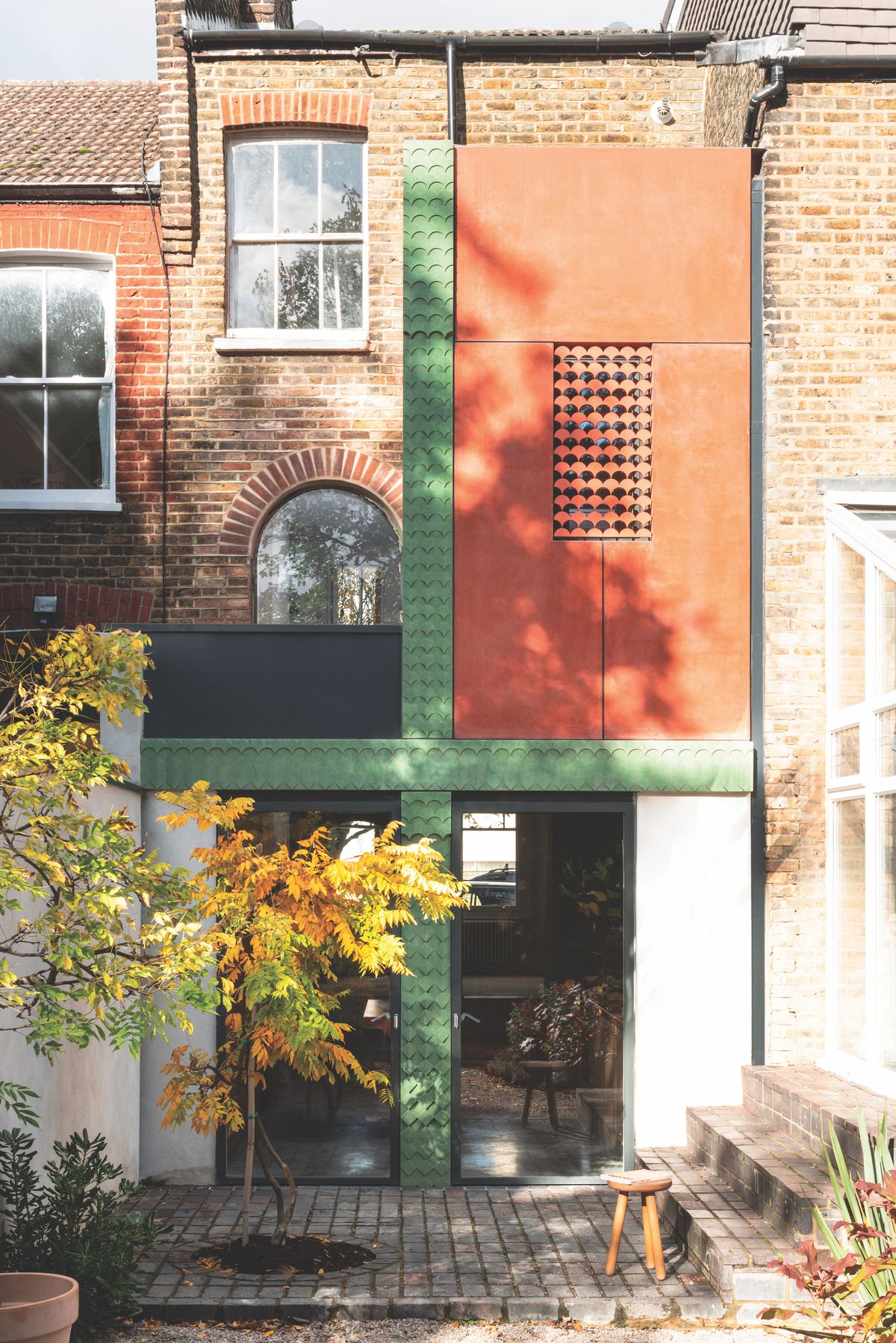 A colourful concrete extension breathes new life into this London ...