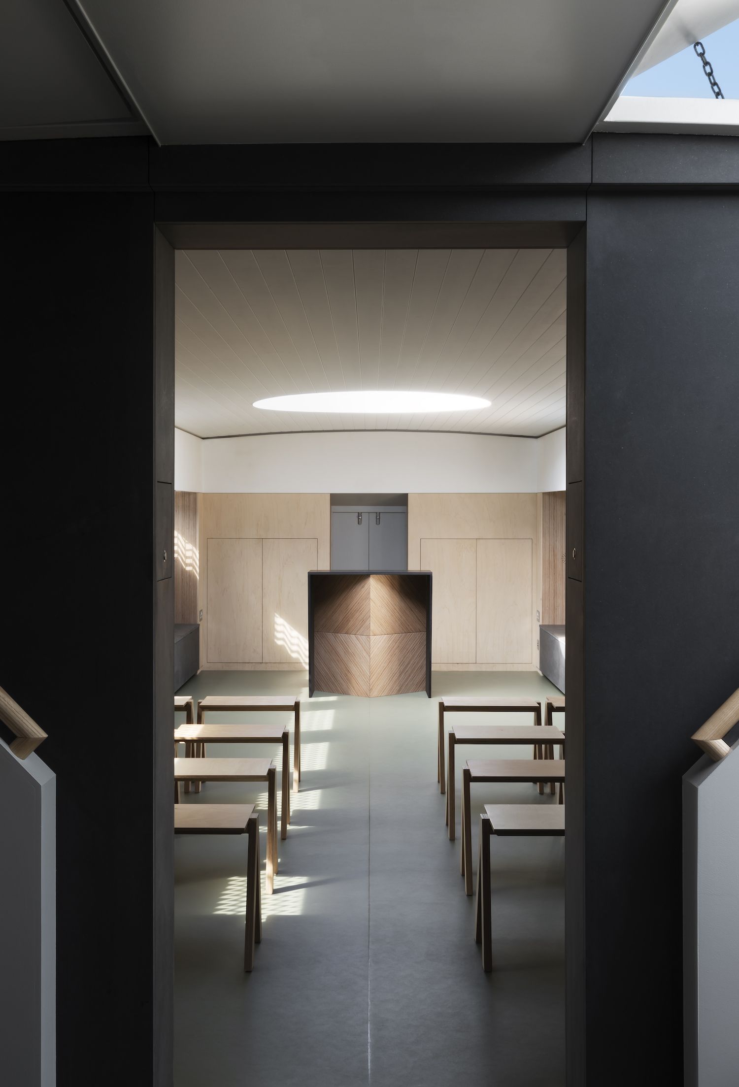 This floating church hides an unexpectedly spacious & modern interior
