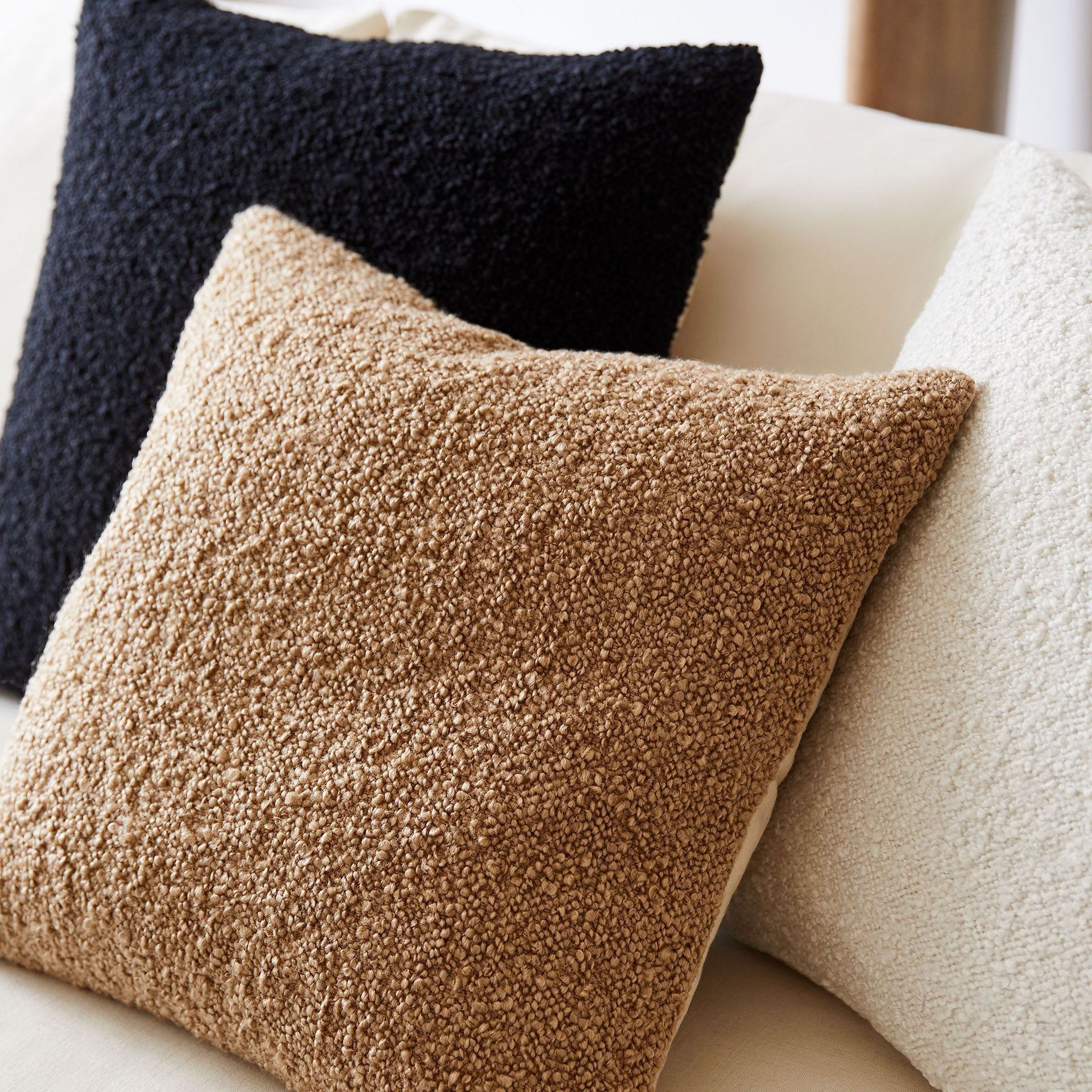 The best bouclé pillows to cozy up to this winter | Homes and Gardens