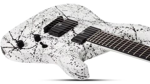 “Each C-1 Ink Bomb is uniquely hand-splattered, making every guitar a ...