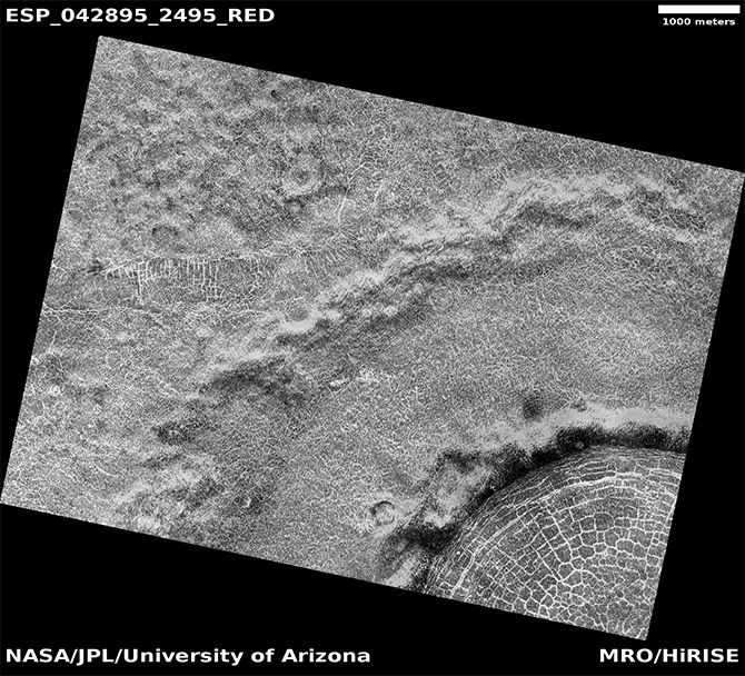 Mars Orbiter Catches a Crater Full of Cracks | Space