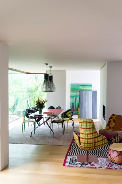 Explore this cabin-style house in Italy with colourful global ...