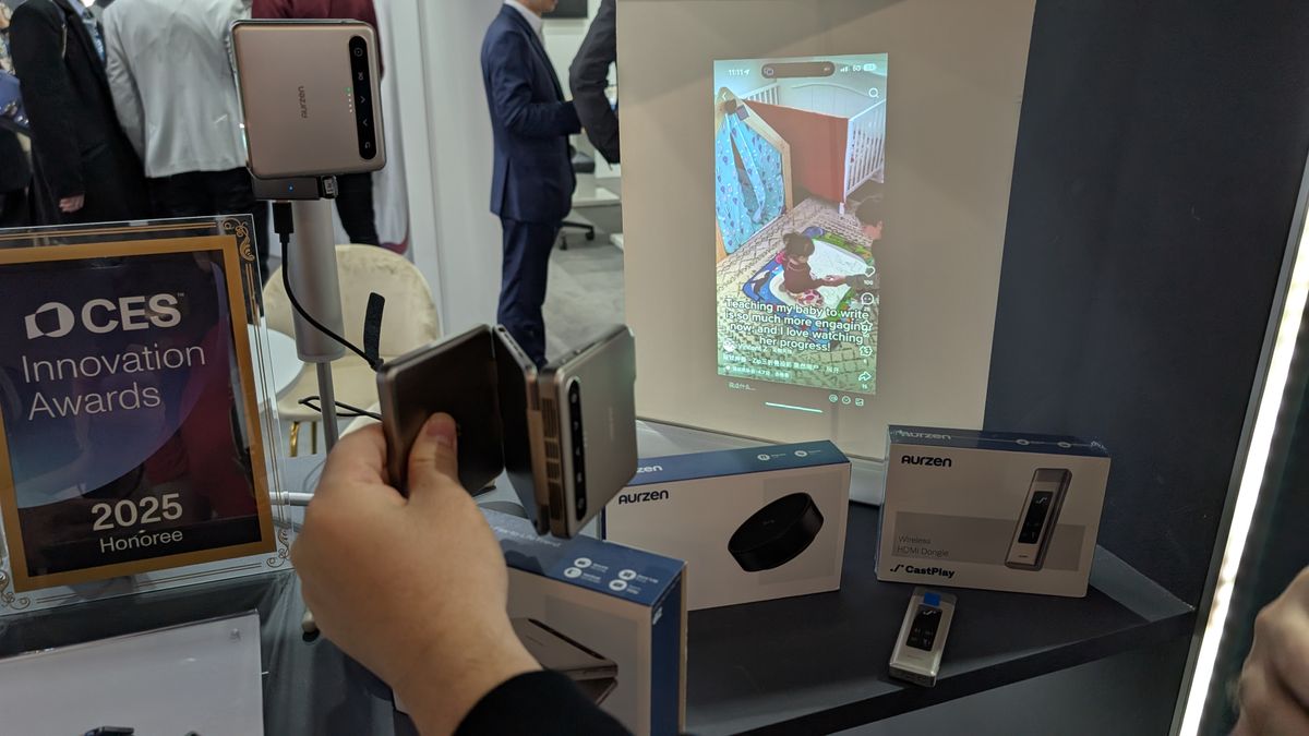 I just tried this foldable projector that fits in the palm of your hand ...