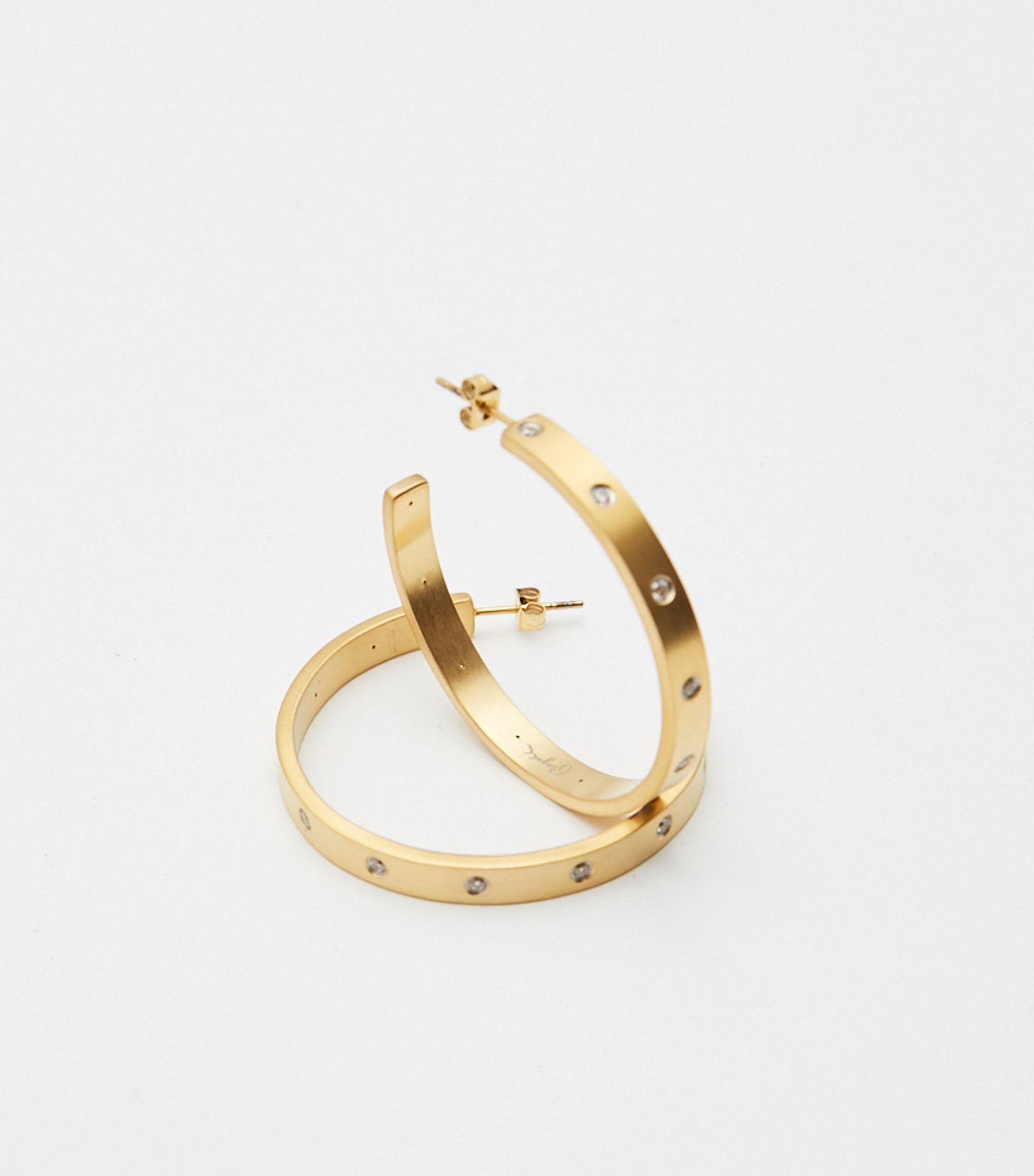 The Cool Hoop Earrings You'll Want to Try Next | Who What Wear