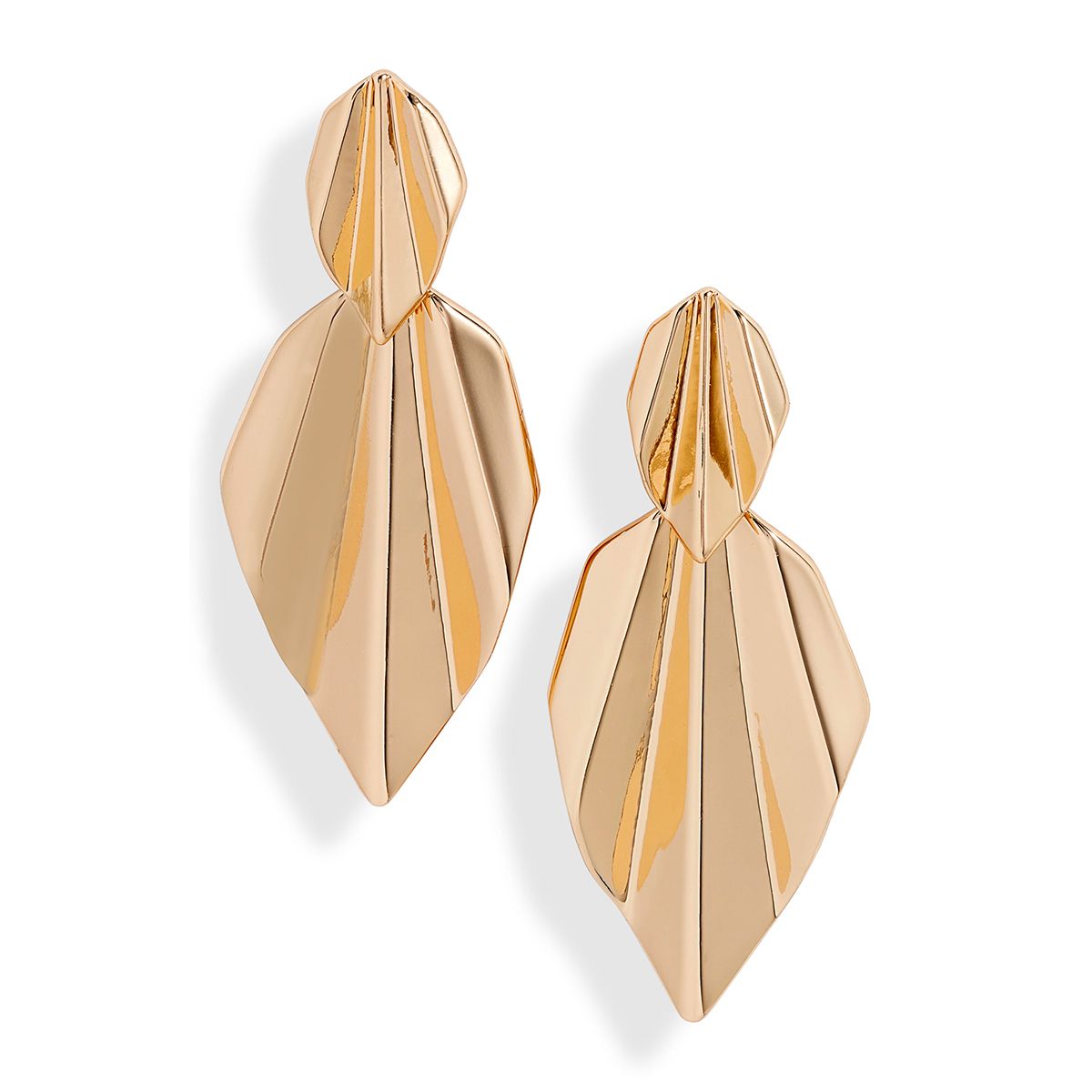 5 Tips for Wearing Heavy Earrings | Who What Wear