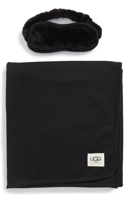 This $12 Travel Accessory Is Blowing Up on Amazon | Who What Wear