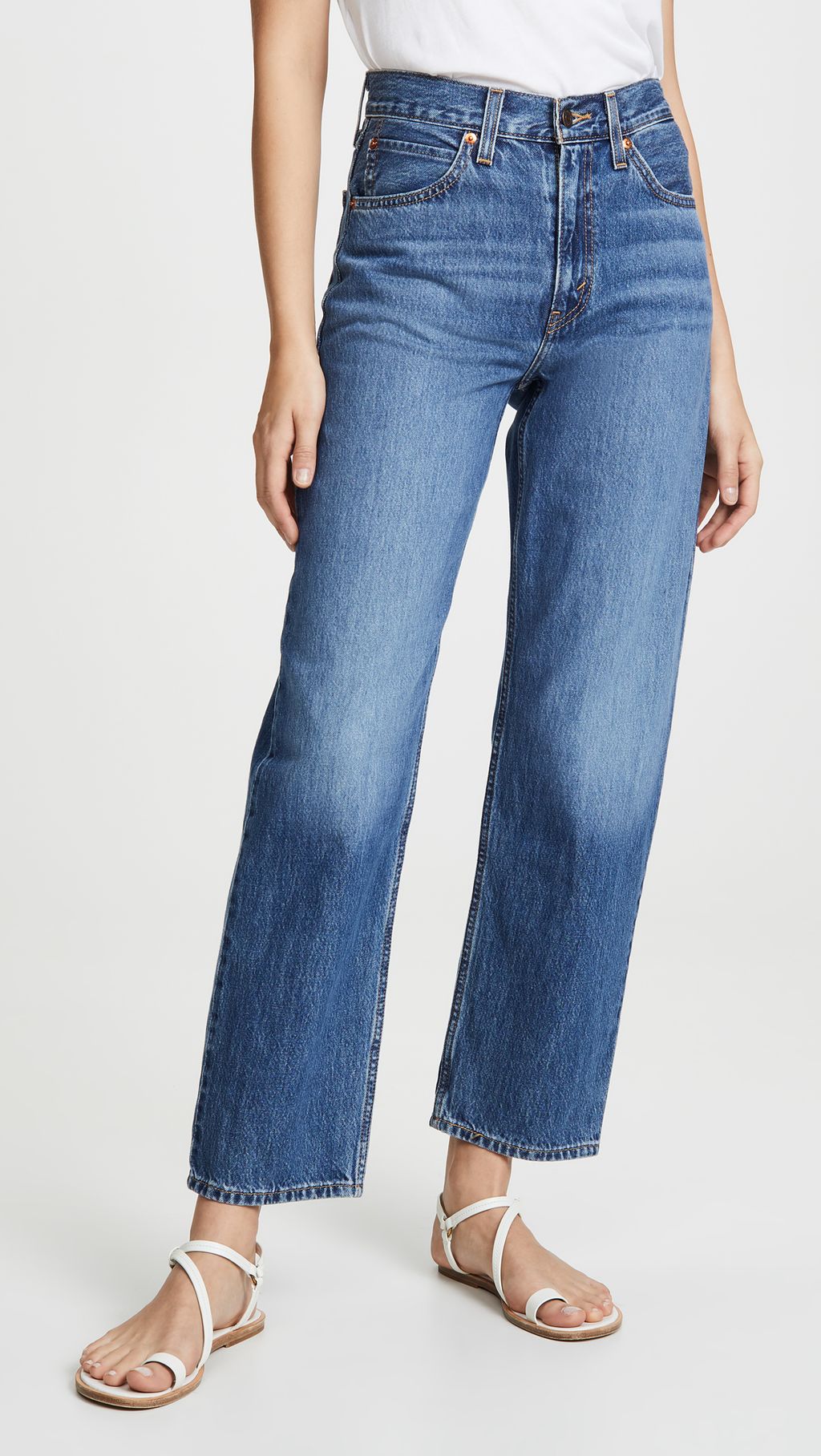 How to Stretch Rigid Jeans With One Simple Trick | Who What Wear