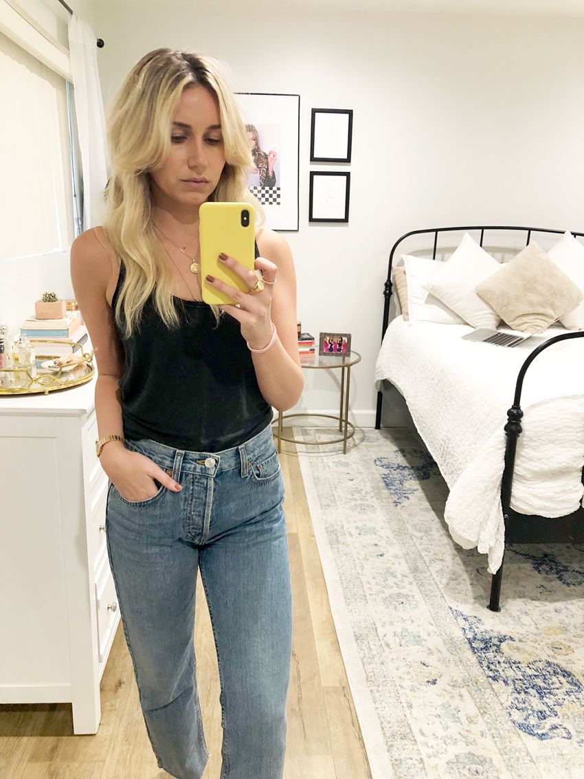 How to Stretch Rigid Jeans With One Simple Trick | Who What Wear