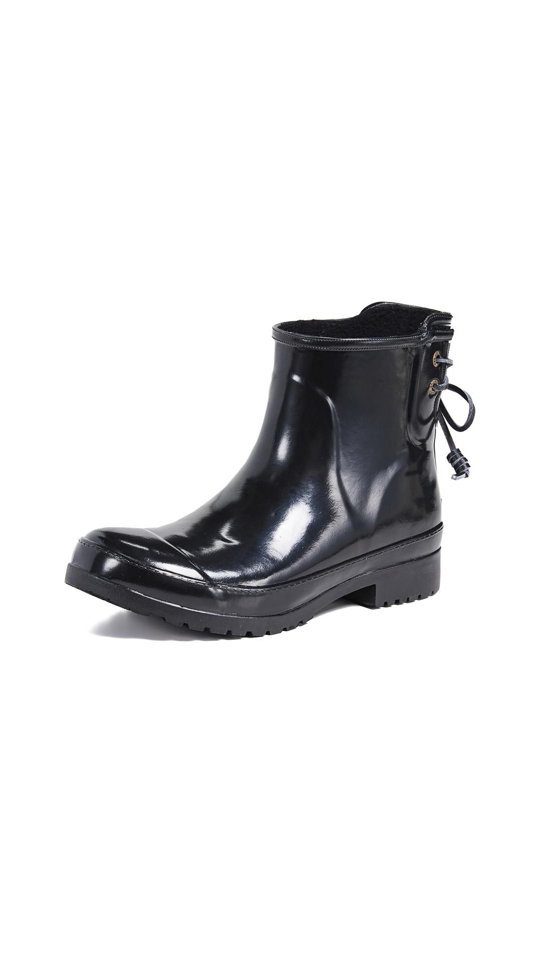 The Cutest Rain Boots Outfits to Wear This Fall | Who What Wear
