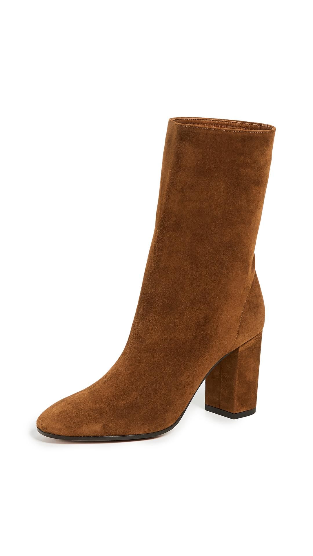French Girls Wear These Classic Boots Year After Year | Who What Wear