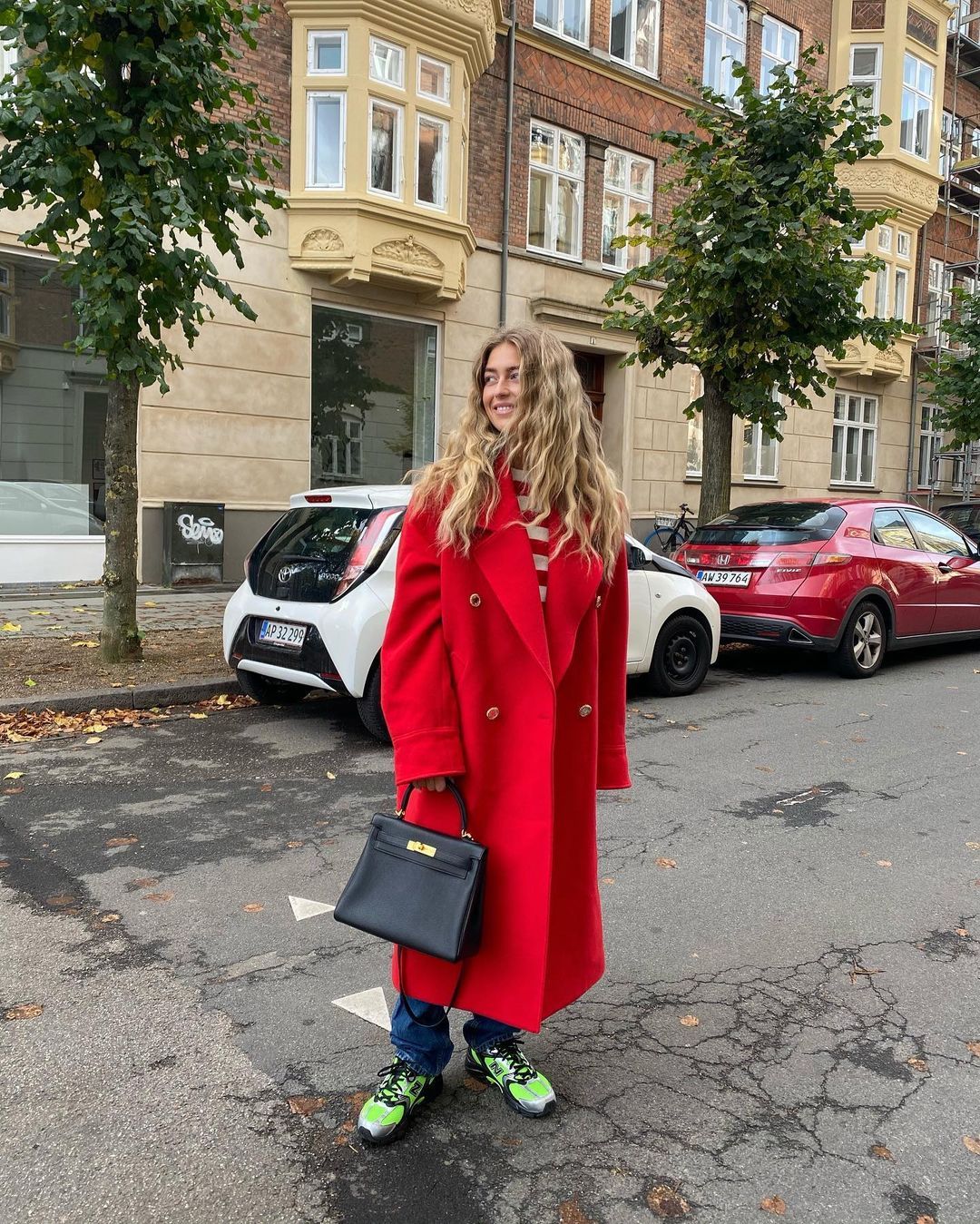13 Statement Coat Outfits We're Living In This Season | Who What Wear