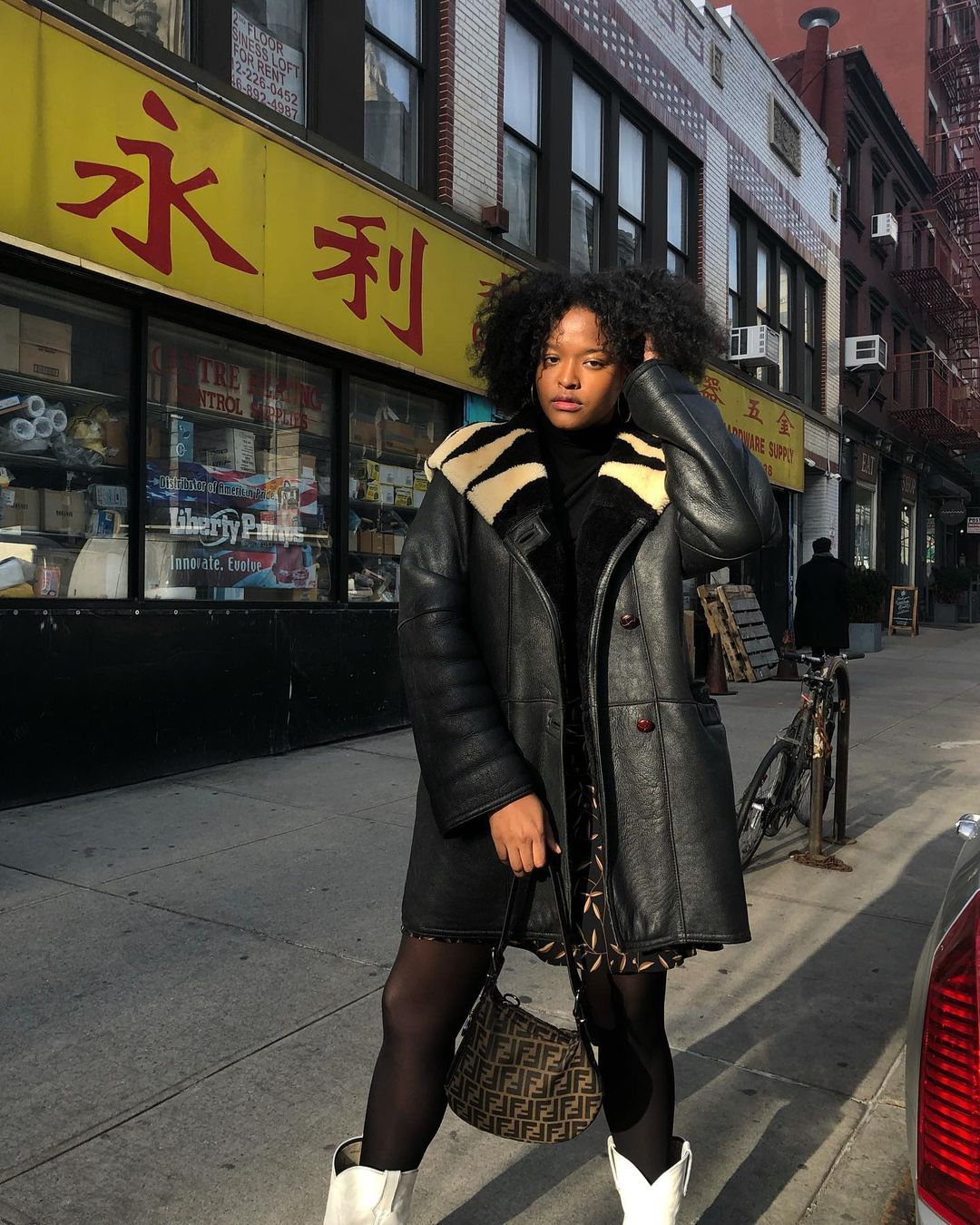 13 Statement Coat Outfits We're Living In This Season | Who What Wear
