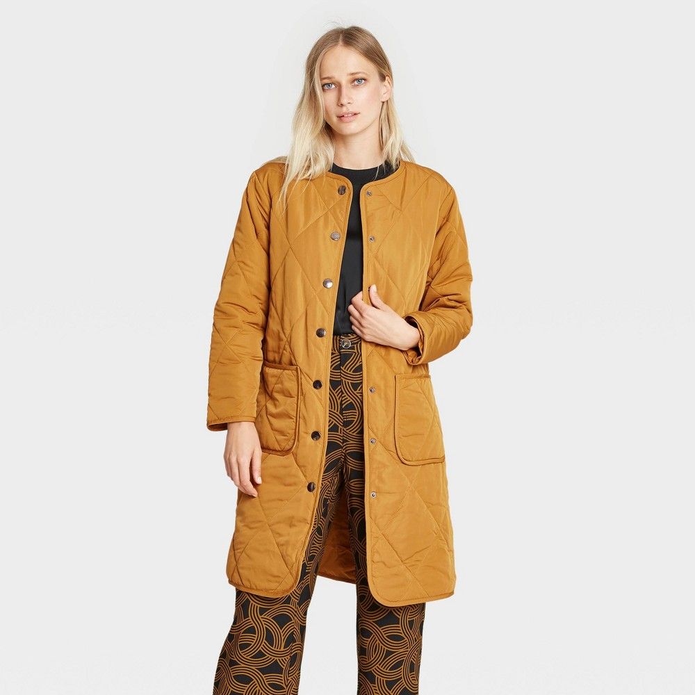 13 Statement Coat Outfits We're Living In This Season | Who What Wear