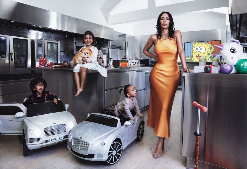 Kim Kardashian Wears a Sheer Tank Top on Her Vogue Cover | Who What Wear