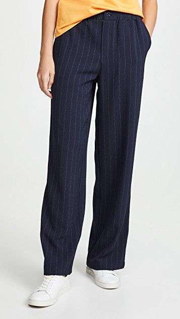 The Long Pants Trend That Just Canceled Your Cropped Pairs | Who What Wear