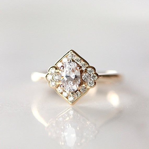 These Are the 17 Most Stunning Cluster Engagement Rings | Who What Wear